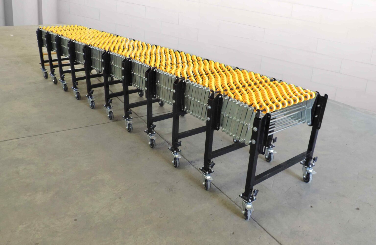 TRANSPORTADOR FLEXIBLE de Ruedas de Patín - Best Conveyors & Racks